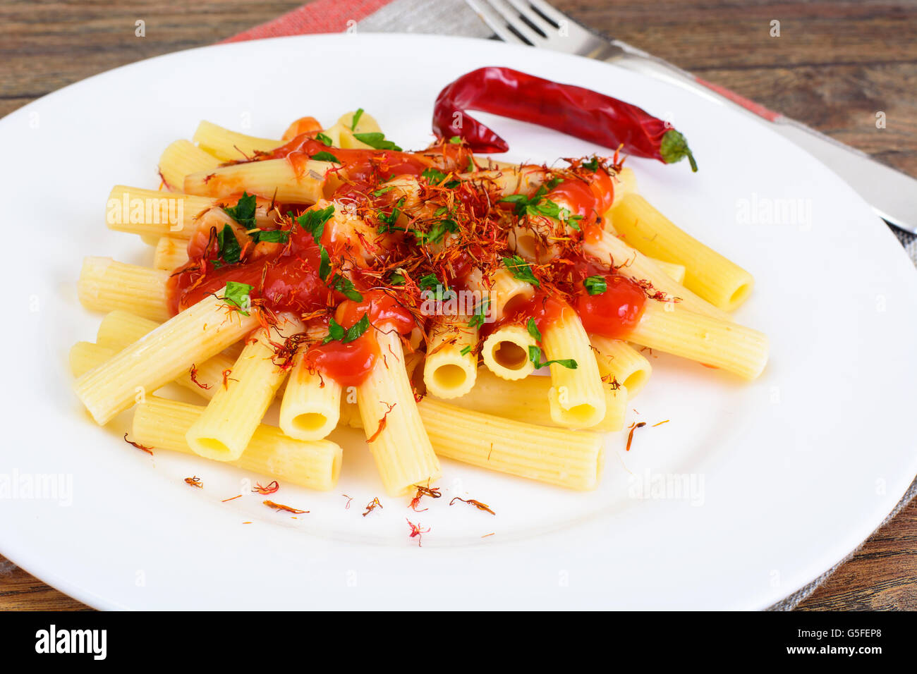 Pasta with Tomato Sauce Ketchup and Saffron Stock Photo - Alamy