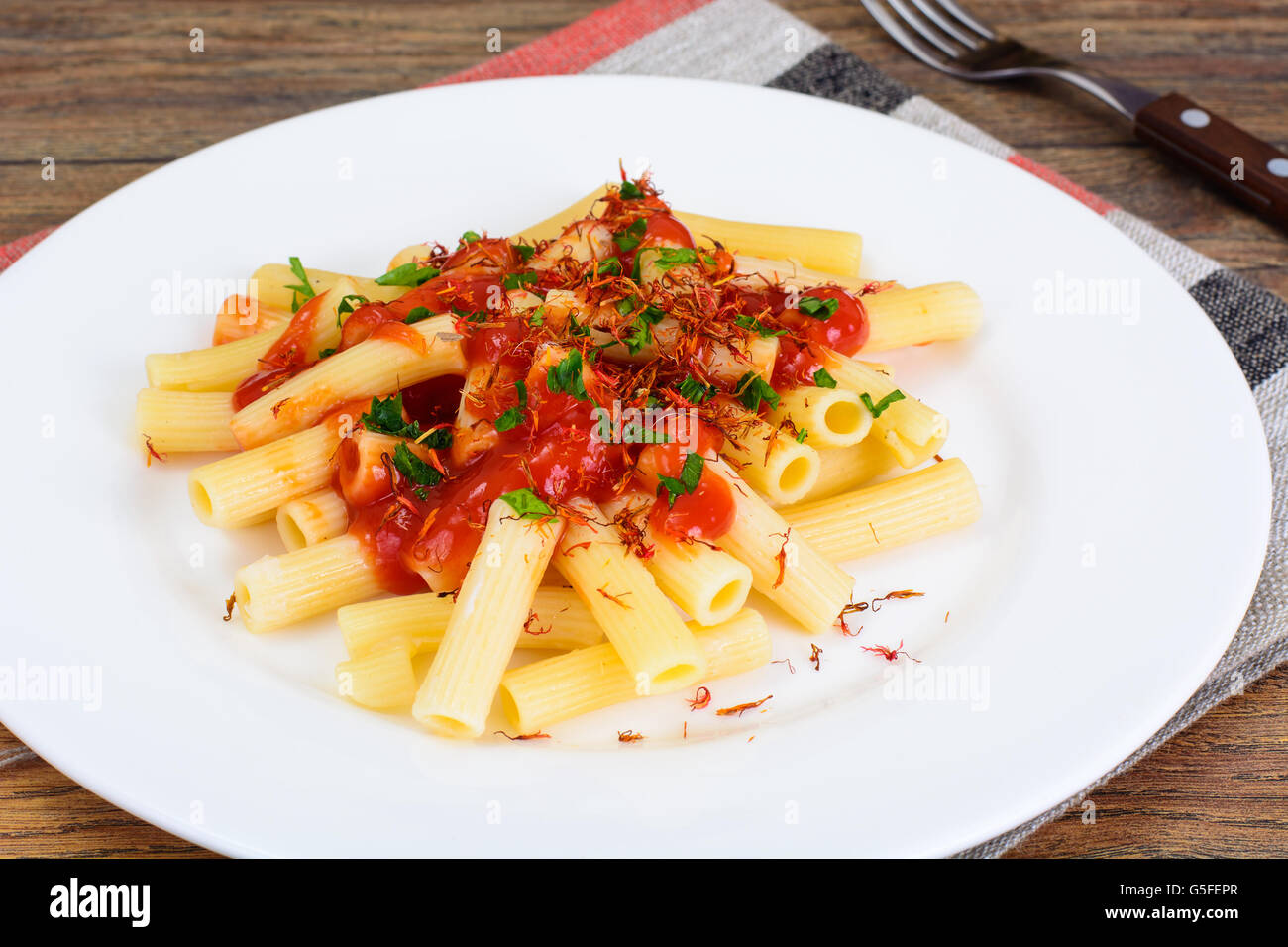Pasta with Tomato Sauce Ketchup and Saffron Stock Photo - Alamy
