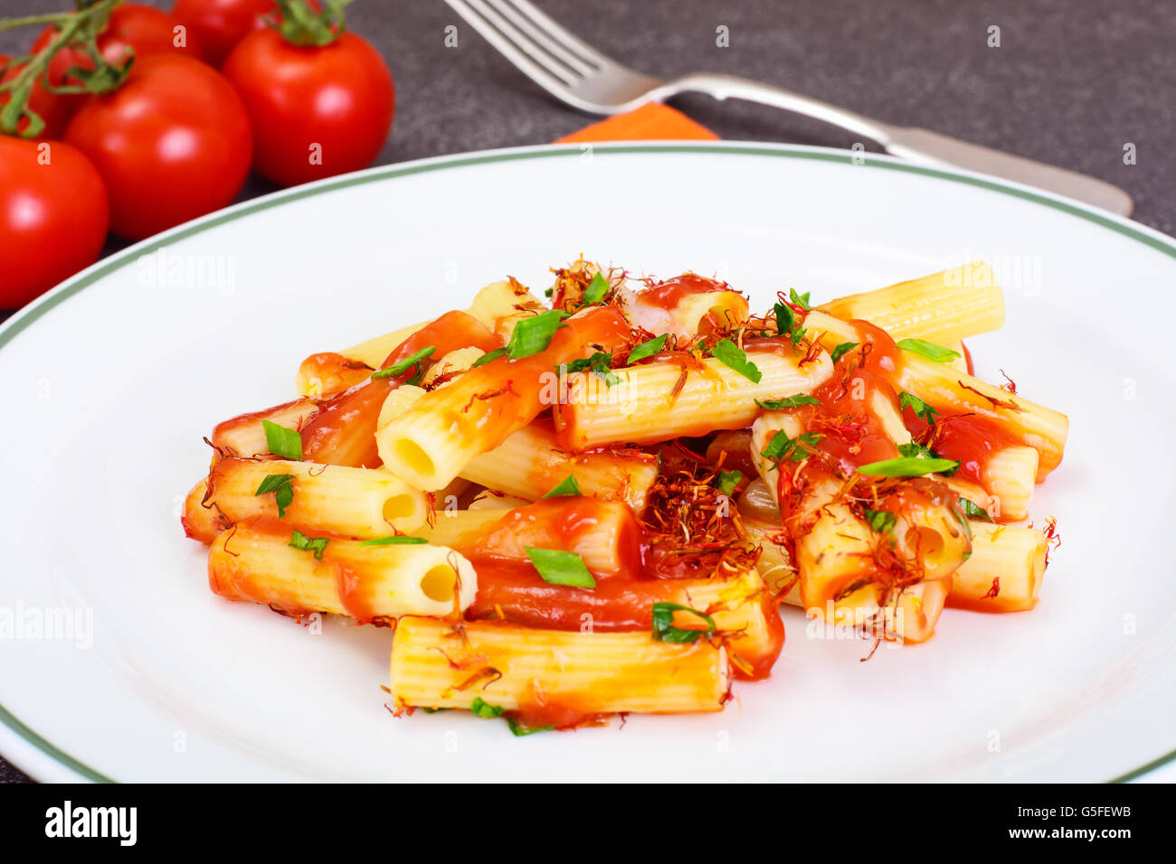 Pasta with Tomato Sauce Ketchup and Saffron Stock Photo - Alamy