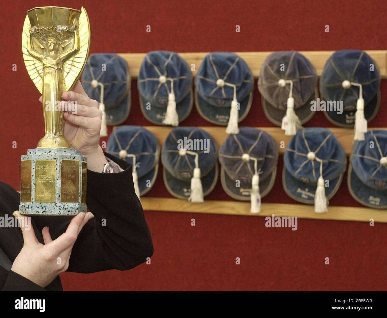 Rachel Dewhurst from Christie's holds a yellow metal replica Jules ...