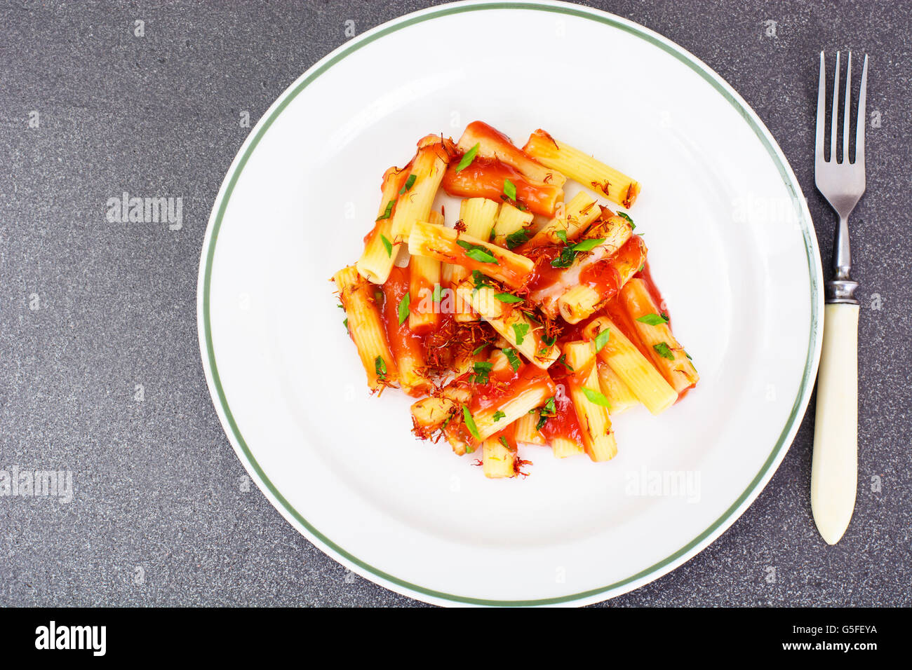 Pasta with Tomato Sauce Ketchup and Saffron Stock Photo - Alamy