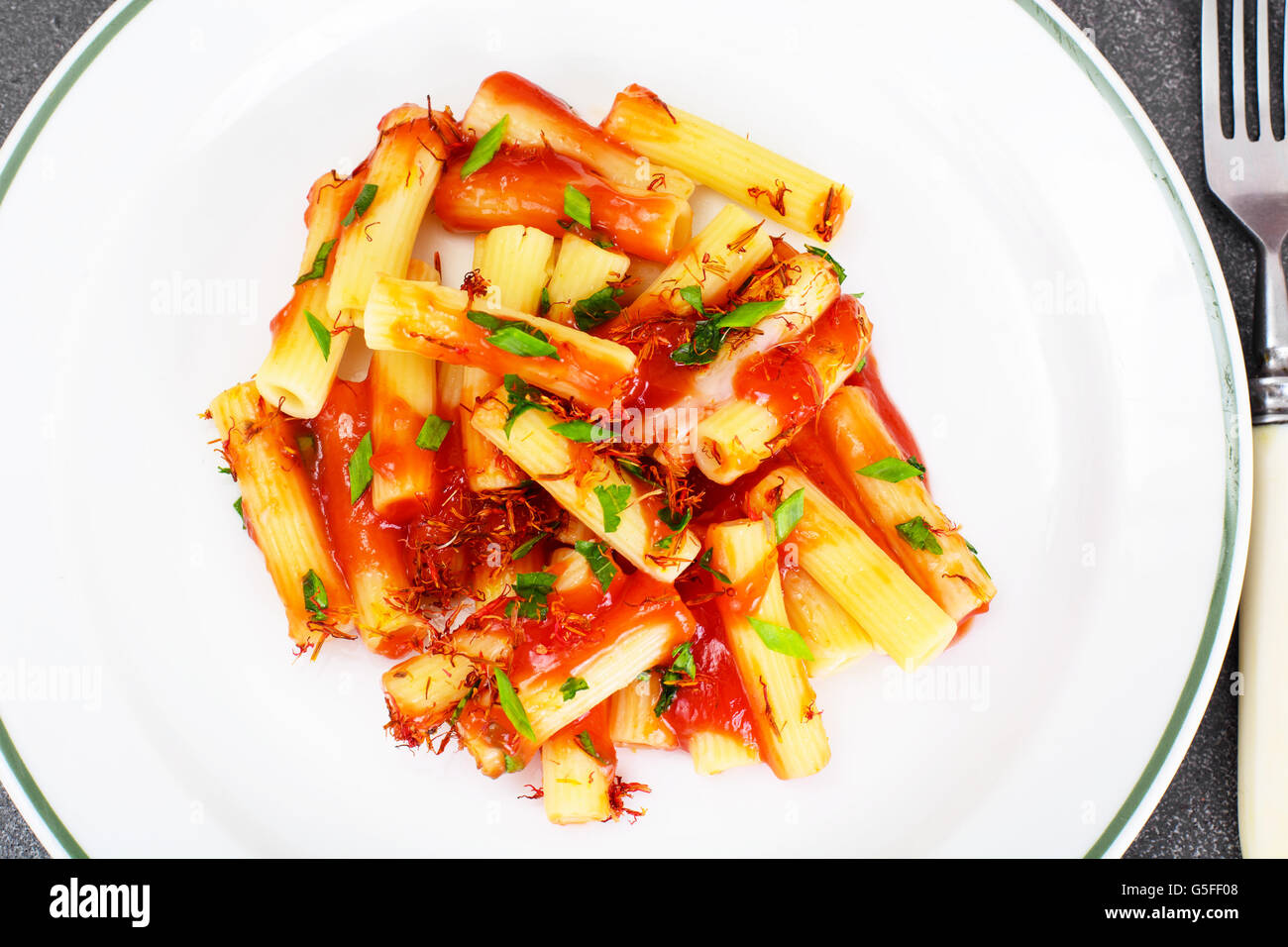Pasta with Tomato Sauce Ketchup and Saffron Stock Photo - Alamy
