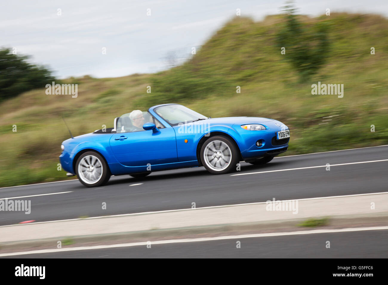 Side view Blue Mazda MX 5 en-route to Southport's beautiful Victoria ...