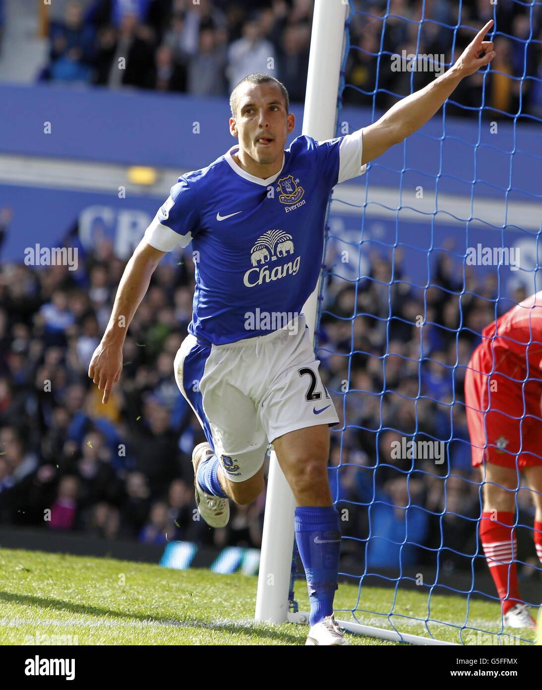 Everton's Leon Osman celebrates scoring his sides third goal during the ...