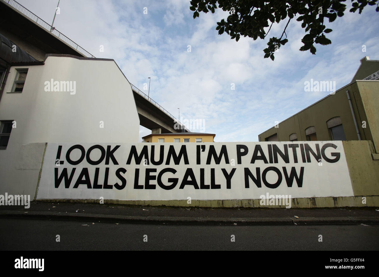 A mural by UK street artist Mobstr on the side of a wall in Stavanger ...