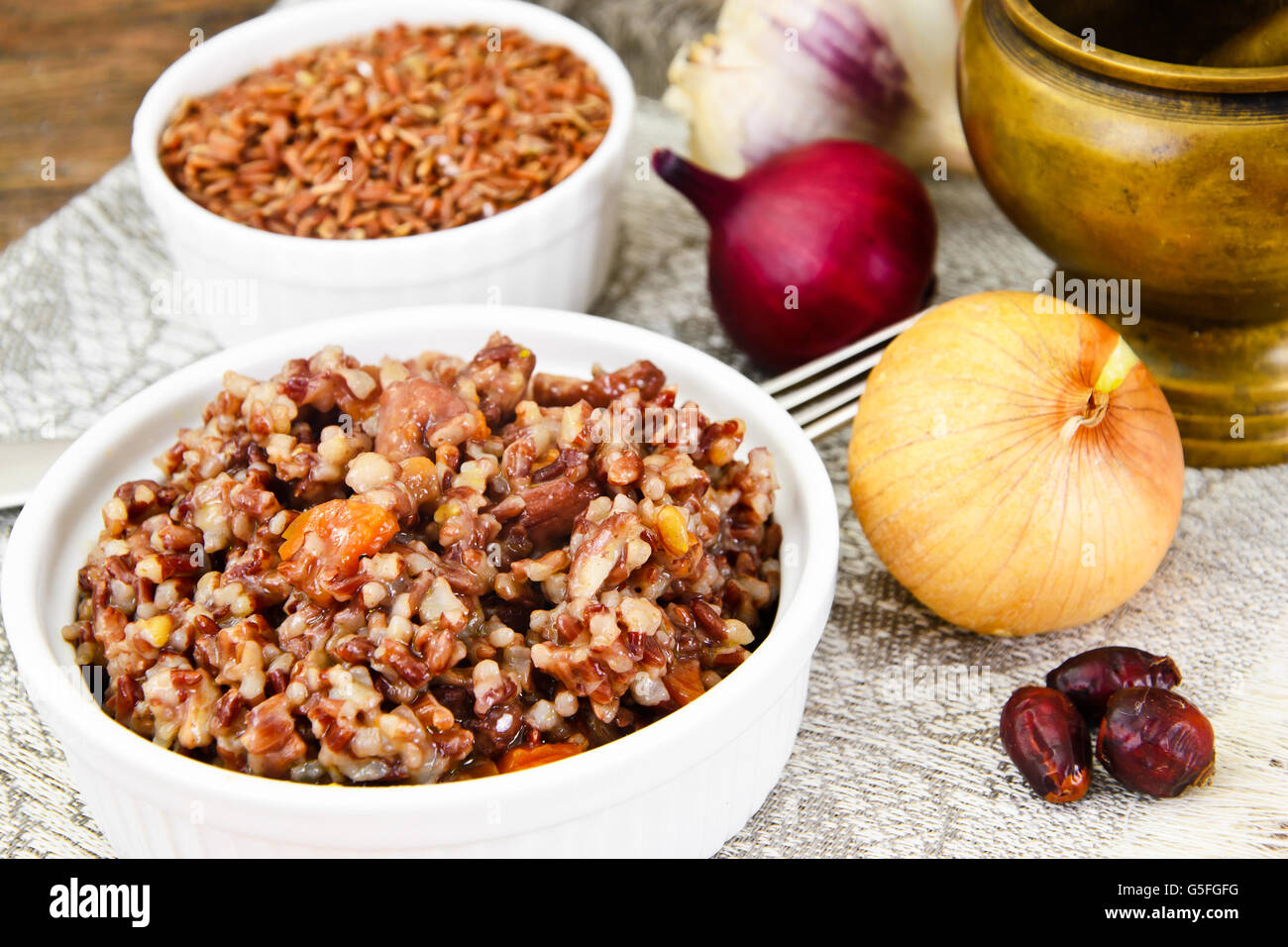 Pilaf with Meat, Carrots and Red Rice Stock Photo - Alamy
