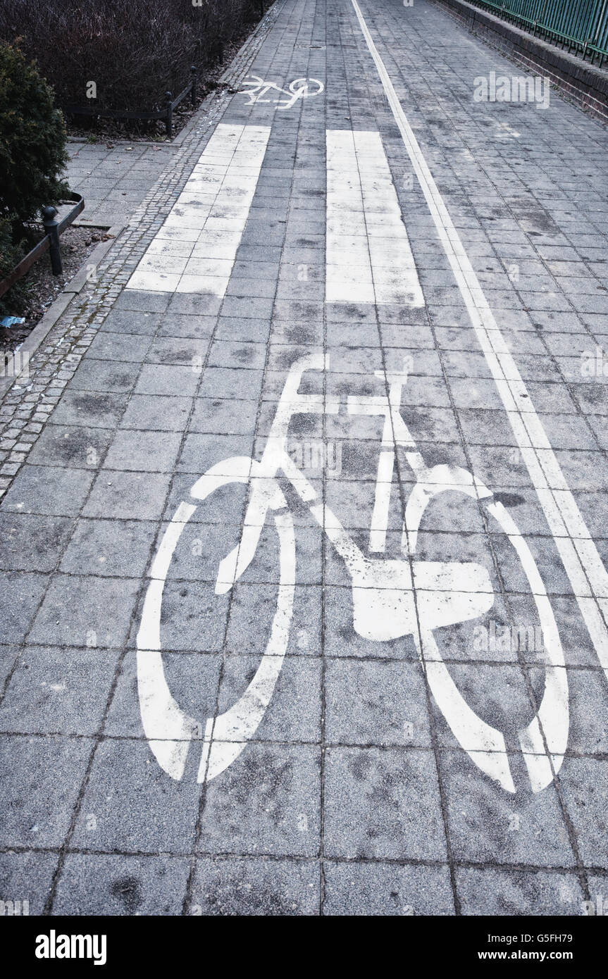 Bicycle lane signage on street Stock Photo - Alamy
