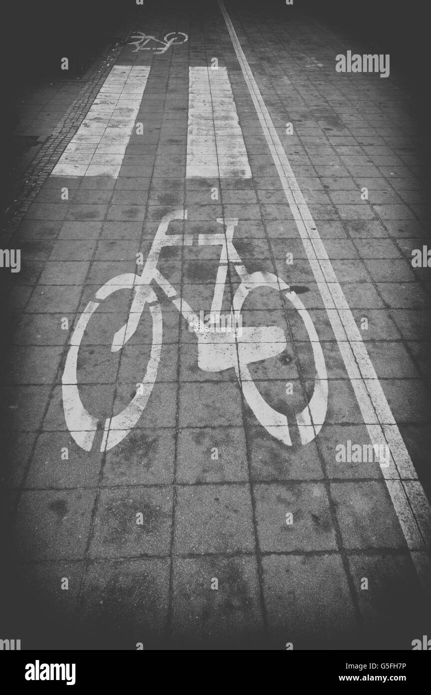 Bicycle lane signage on street, black and white Stock Photo - Alamy