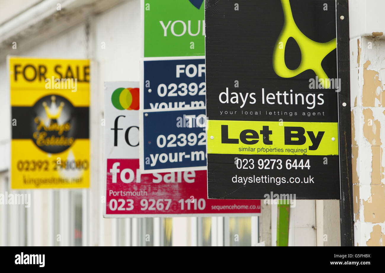 General view of an Estate Agent's 'To let', 'For Sale' and 'Let By ...