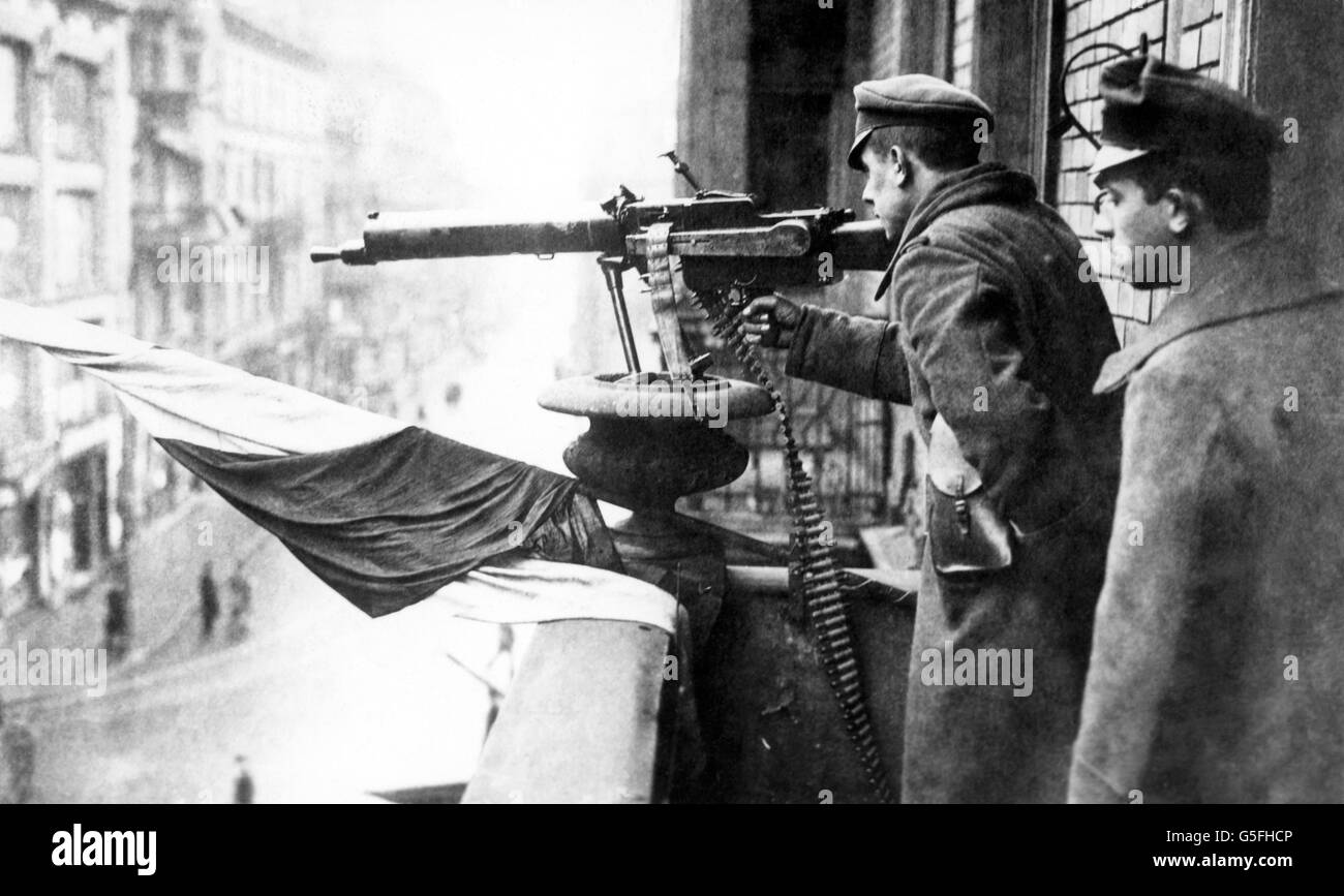Machine gun in action from the balcony of berlin house hi-res stock ...