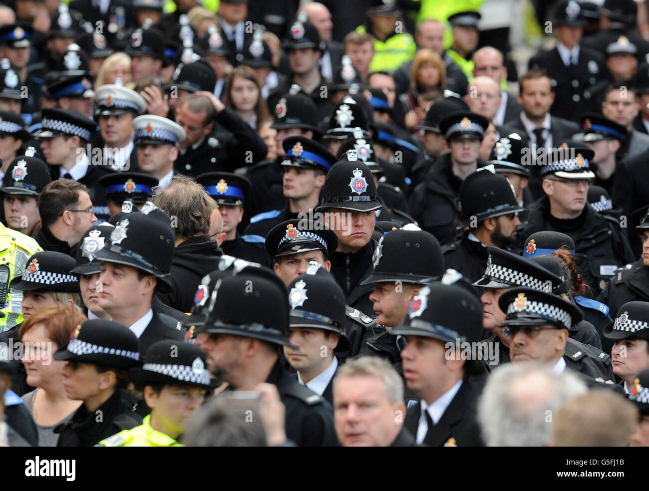 Police officers members public stand together manchester cathedral hi ...