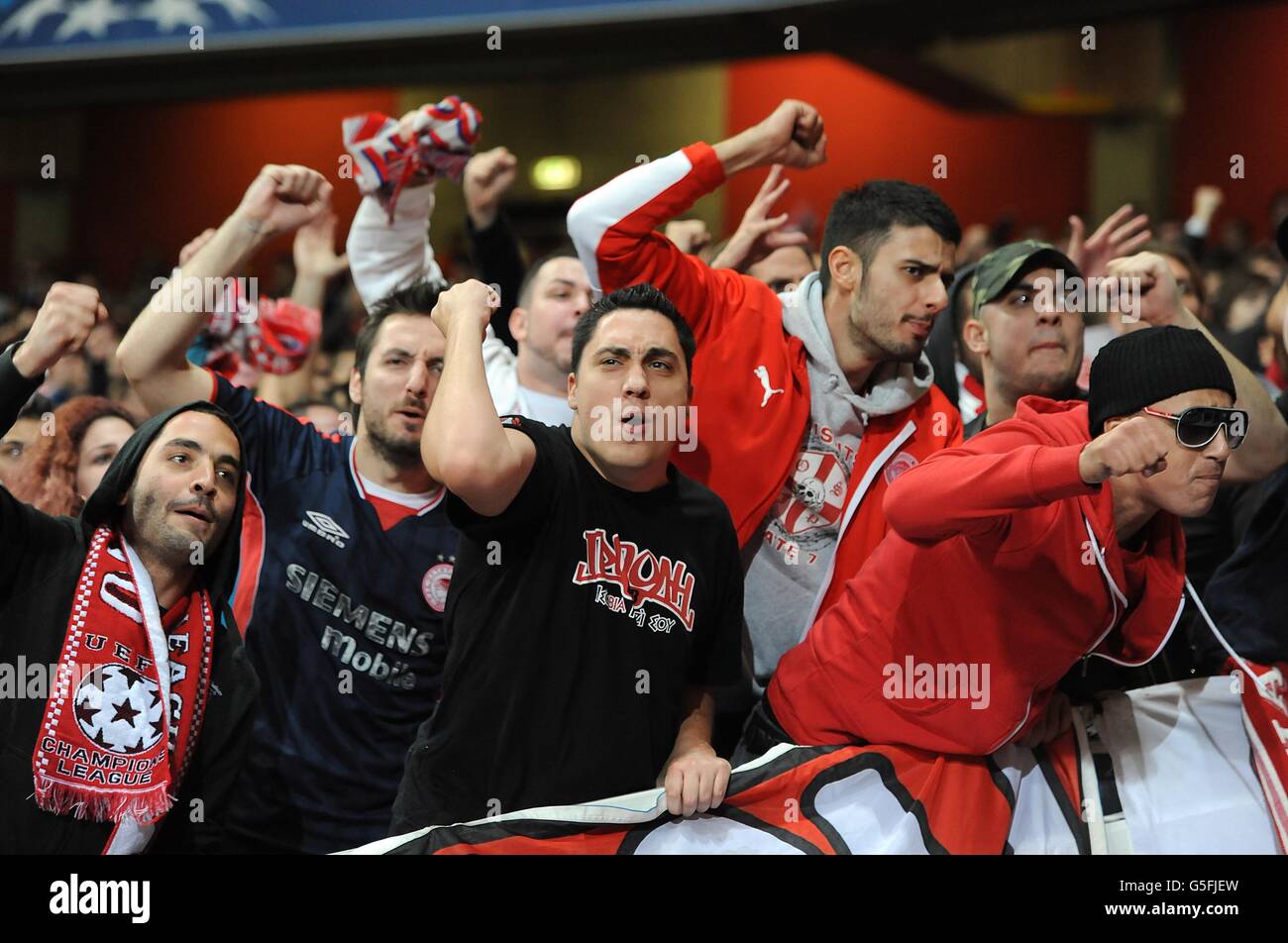 Emirates stadium olympiakos fans in the stands hi-res stock photography ...