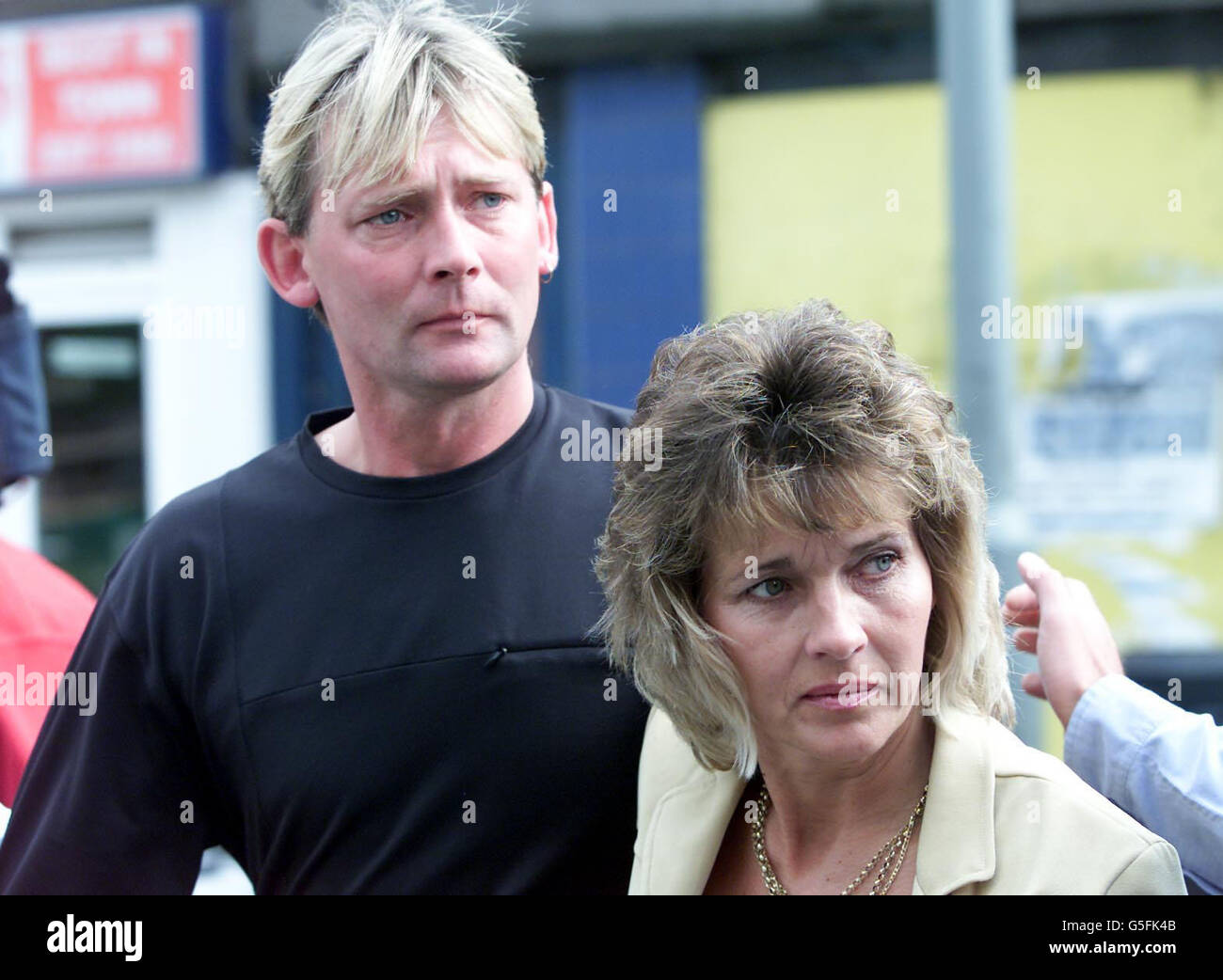 Painter and decorator, Howard Walmsley, 43, and his wife Kathy arrive ...