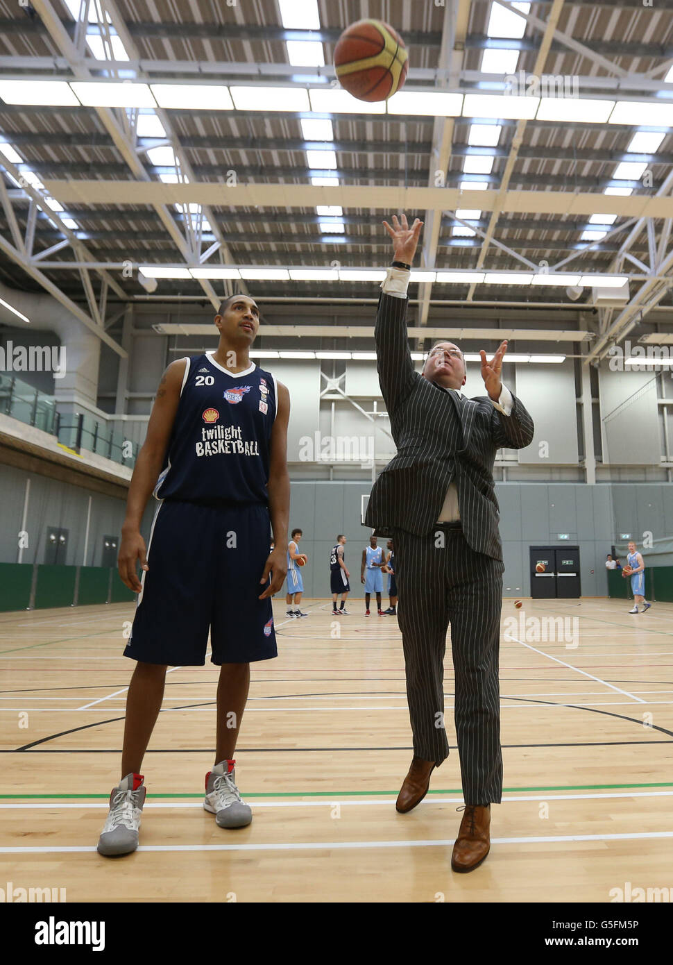 Glasgow Rocks basketball player Kieron Achara (L) with Councillor ...