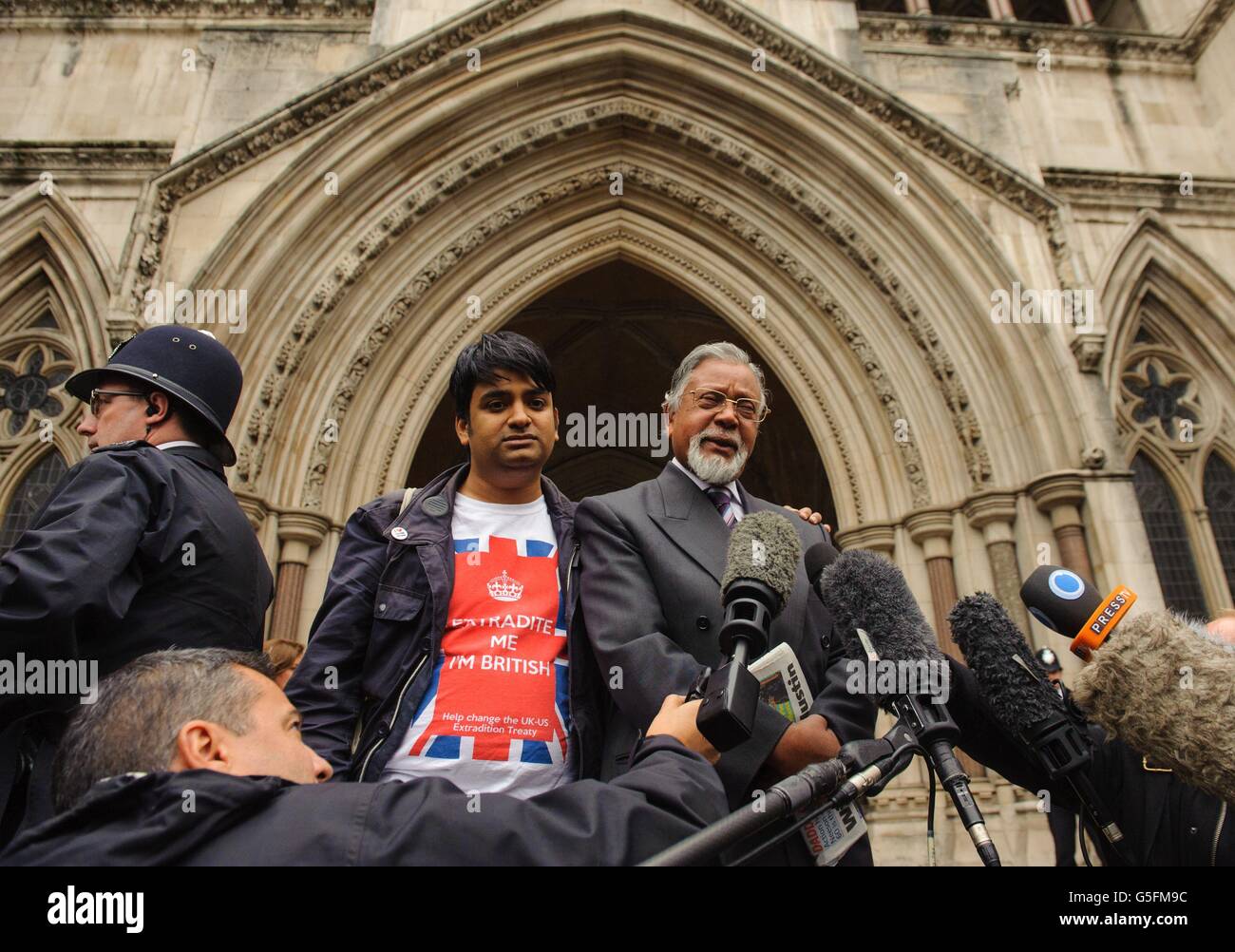 Syed Abu Ahsan, the father of Talha Ahsan (right) and his son Hamja speak to the media outside ...