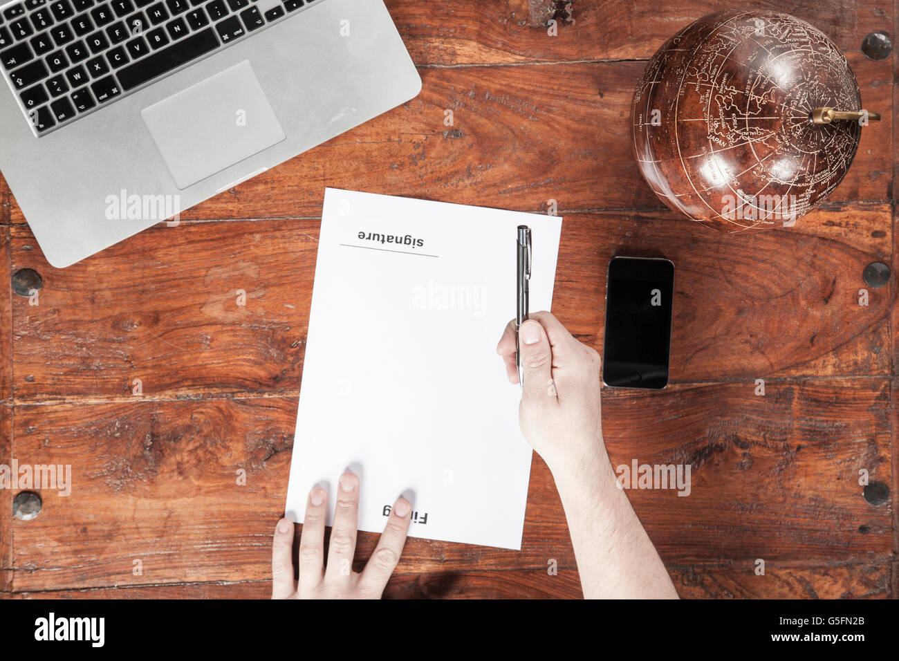 Please sign here Stock Photo - Alamy