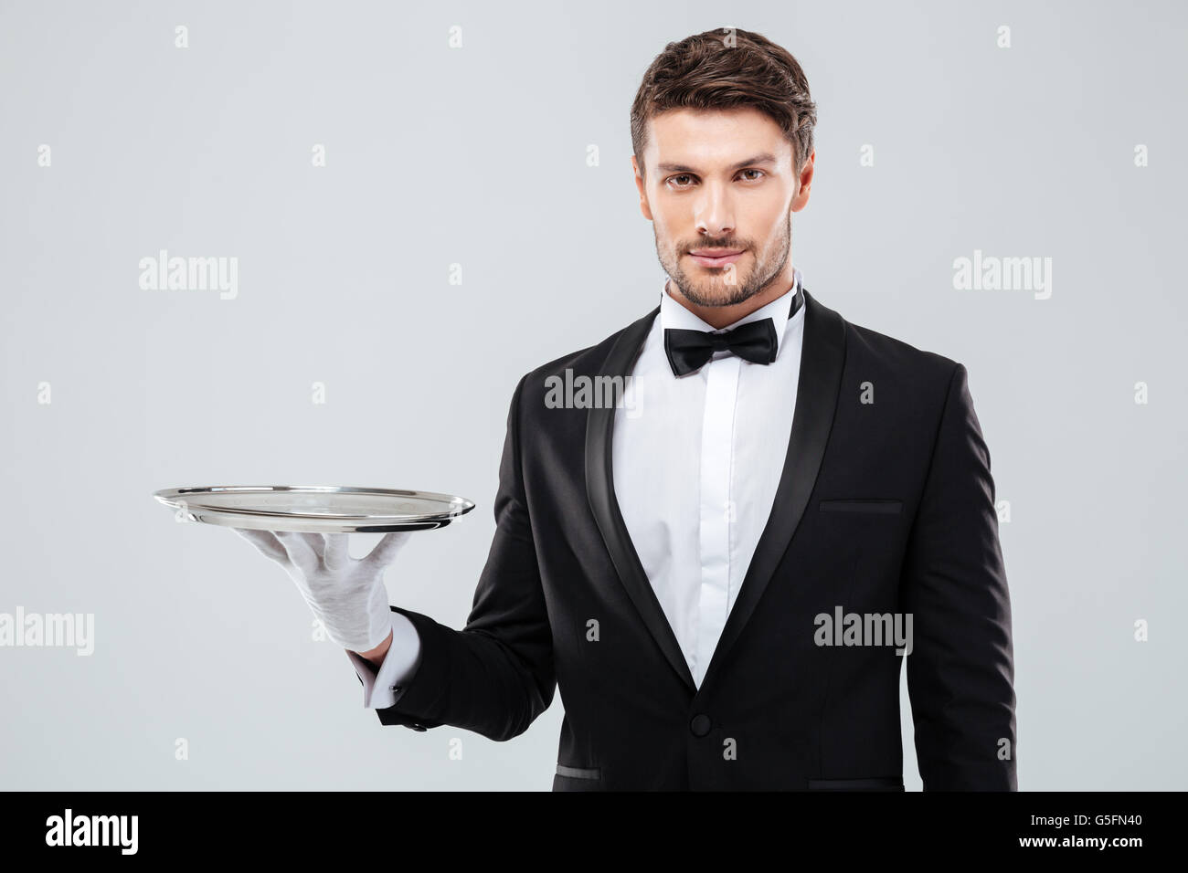 Elegant young butler male servant hi-res stock photography and images ...