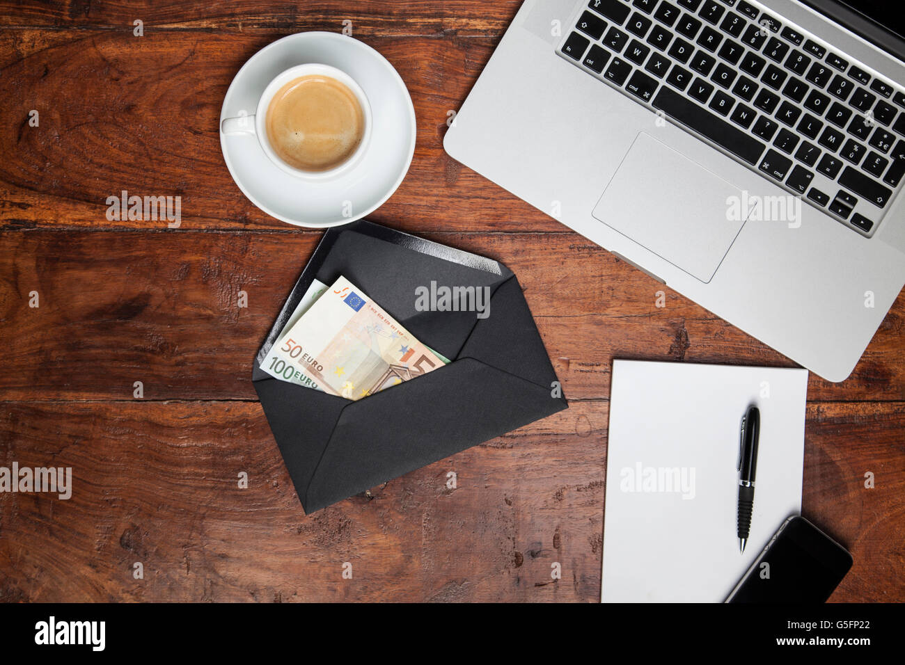 money on the office desk Stock Photo - Alamy