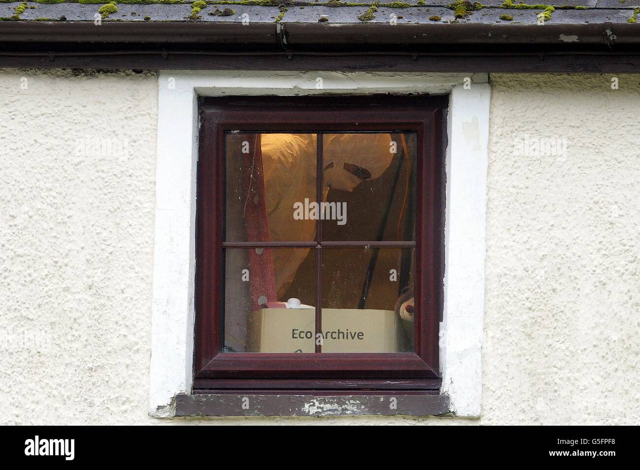 Police at the home of Mark Bridger, 46, who appeared in court today ...