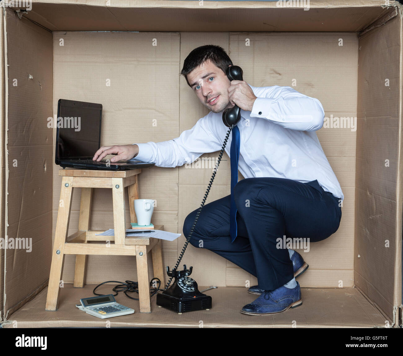 happy businessman doing everything at once Stock Photo - Alamy