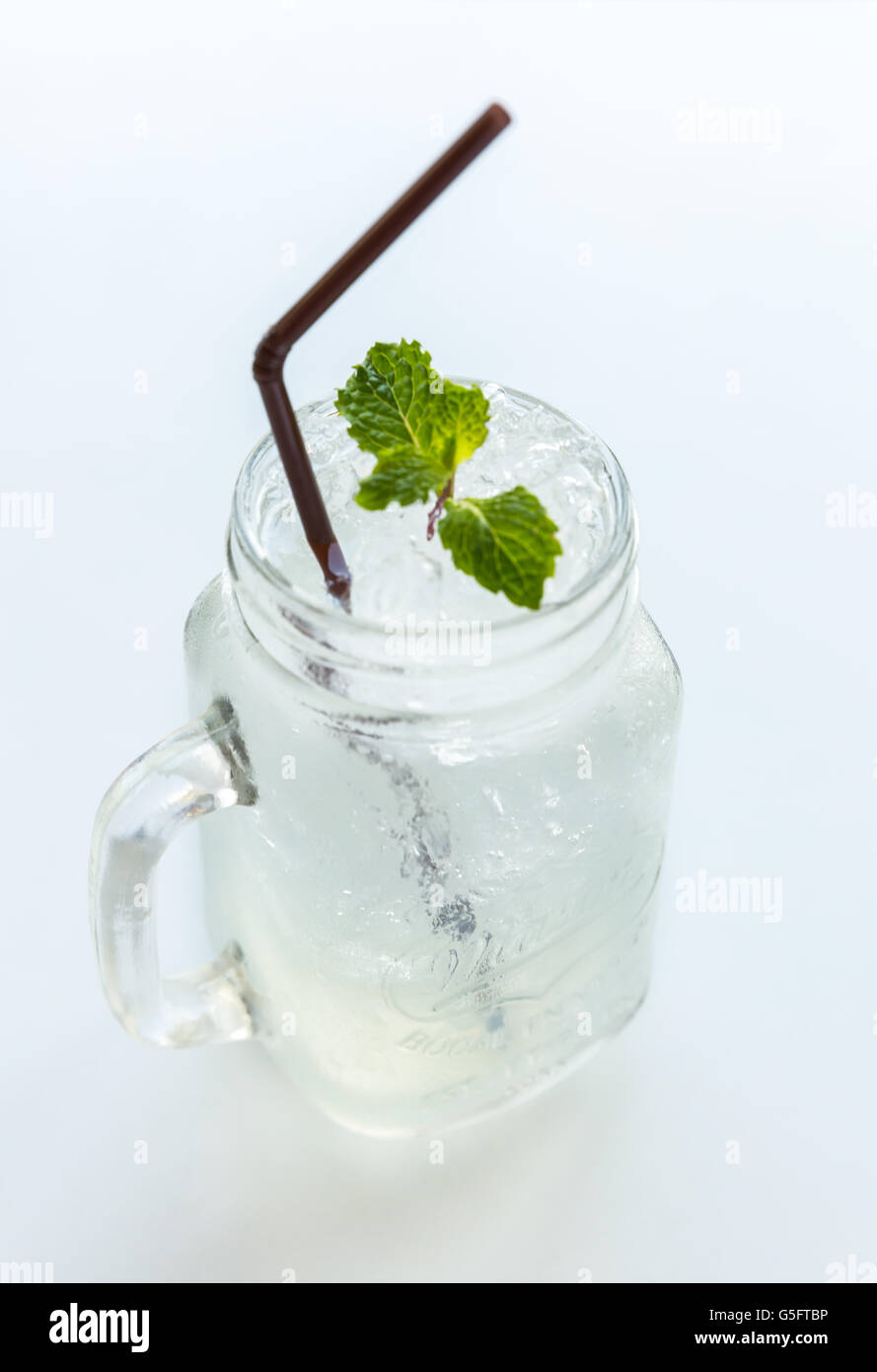 Lemonade with mint on white background Stock Photo - Alamy