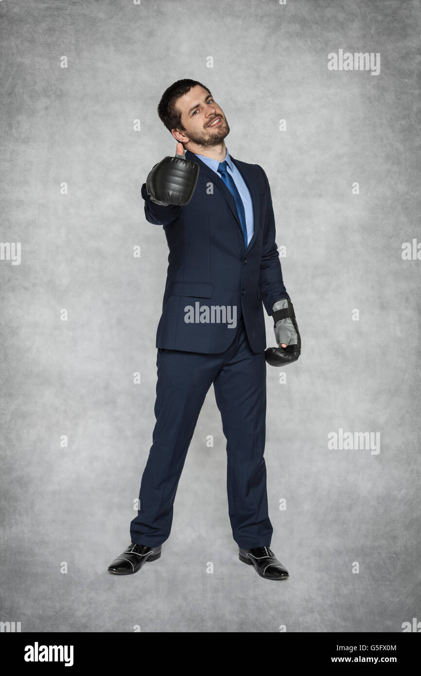 thumbs up businessman in boxing gloves Stock Photo - Alamy