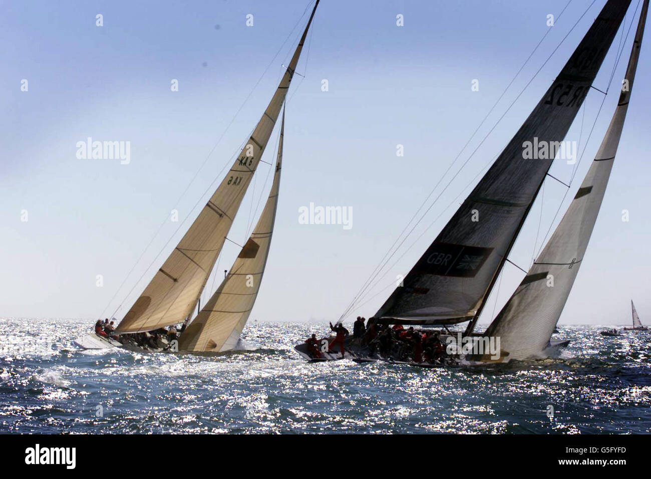 Two times America's Cup winner "Intrepid" (R) chases the modern America ...