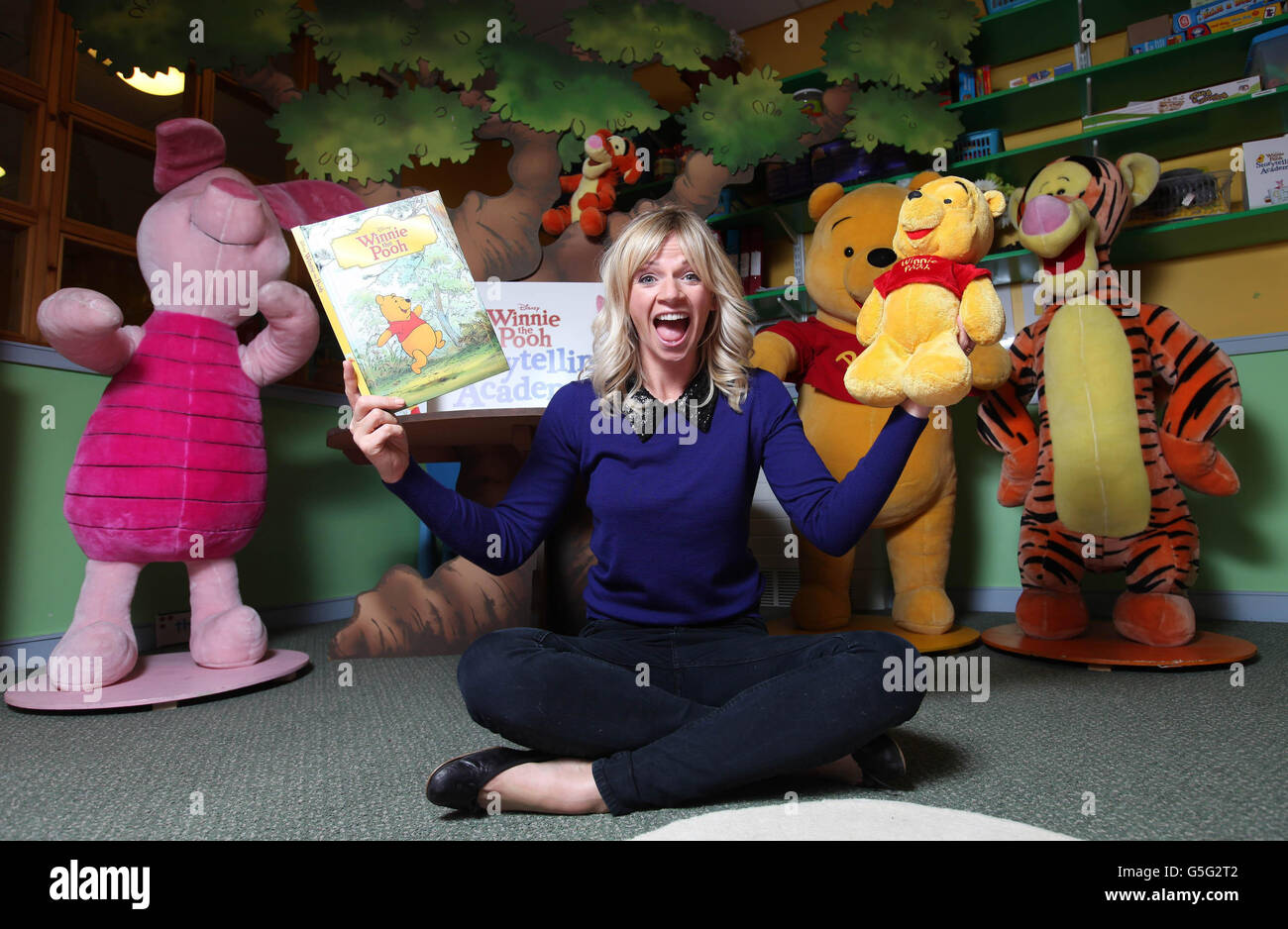 Mother of two, Zoe Ball reads to children at the launch of the Winnie ...