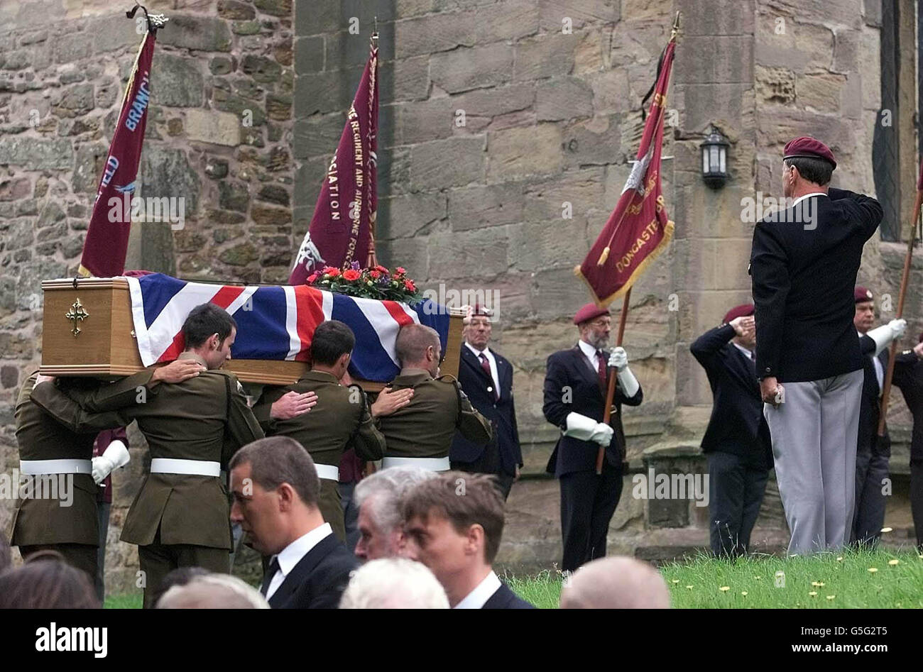 The coffin of paratrooper Ian Collins arrives at St John the Baptist in ...