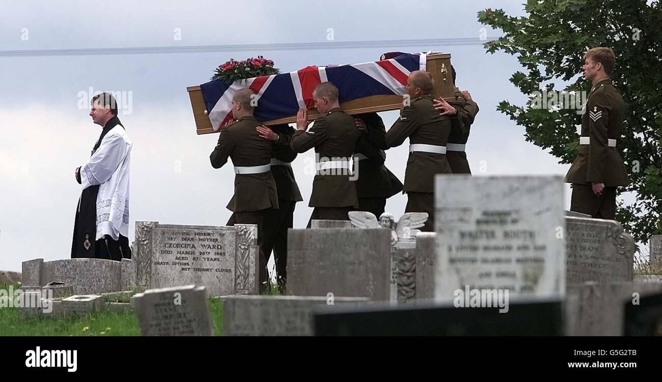 The coffin of paratrooper Ian Collins arrives at St John the Baptist in ...