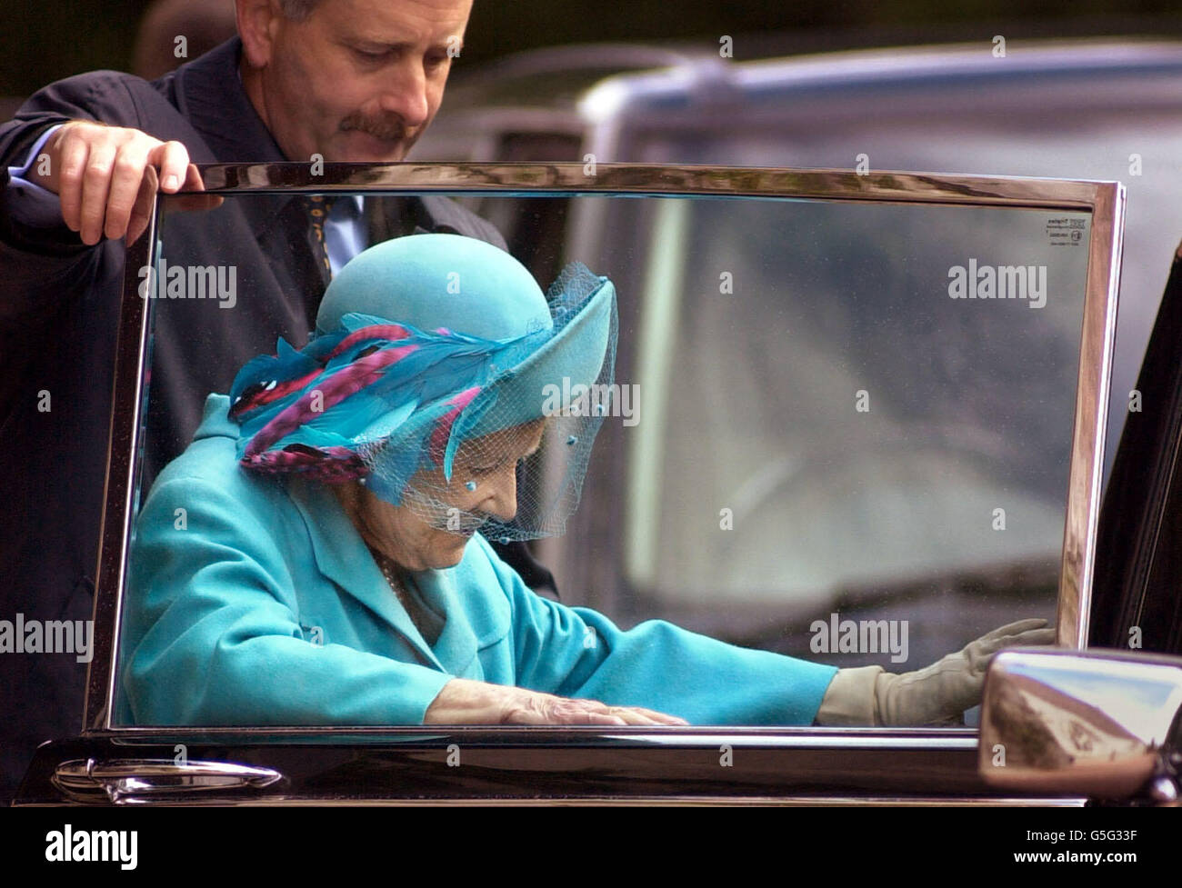 The Queen Mother gets into a car as she leaves the church at Crathie ...