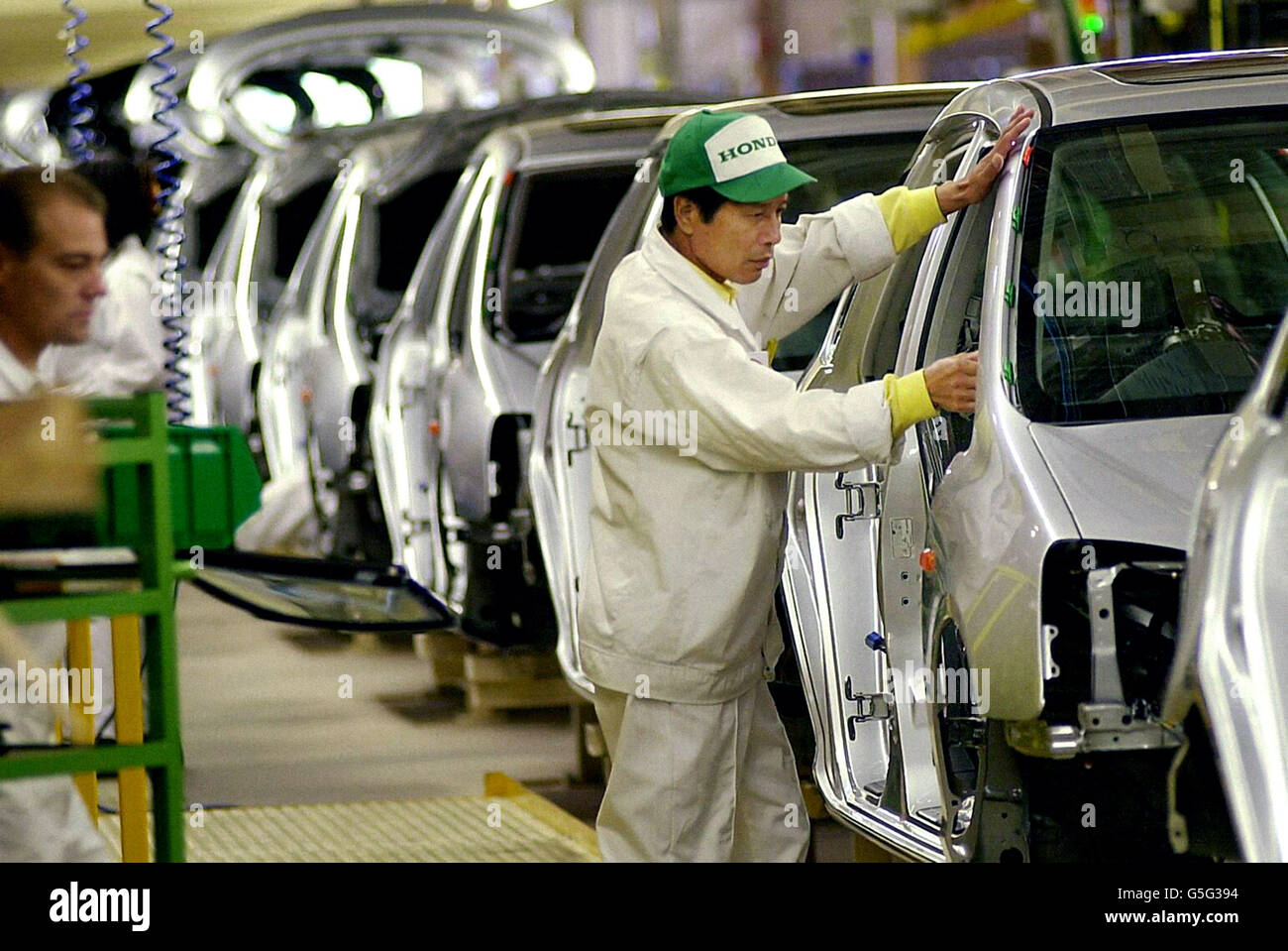 Honda car production 'Associates' at work on Honda Civics in the new ...