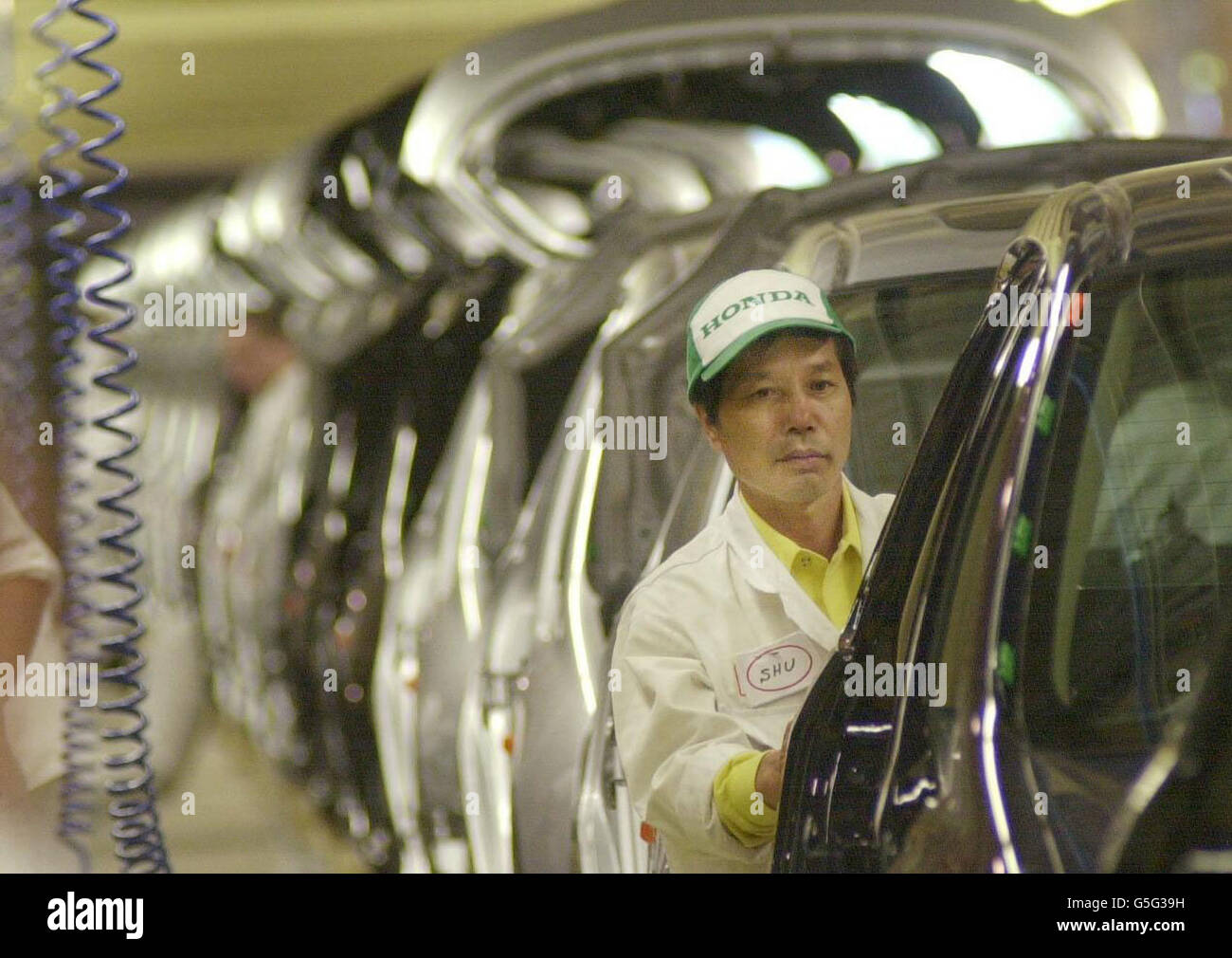 Honda car production 'Associates' at work on Honda Civics in the new ...