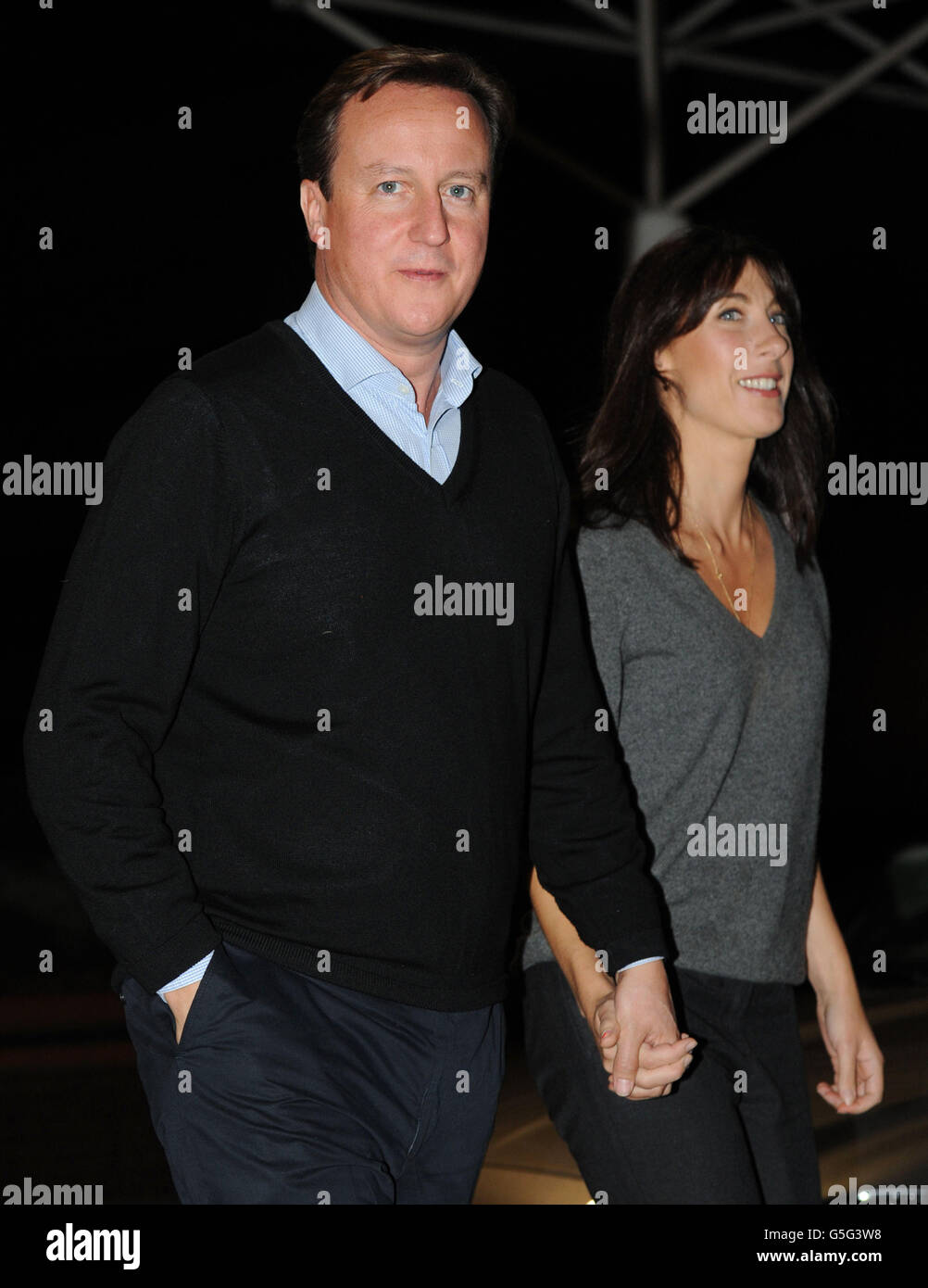 Prime Minister David Cameron and his wife Samantha arrive at their ...