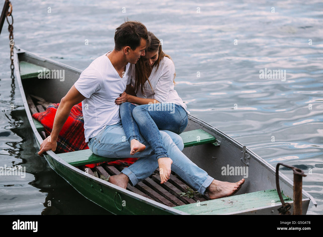 Couple in boat Stock Photo - Alamy