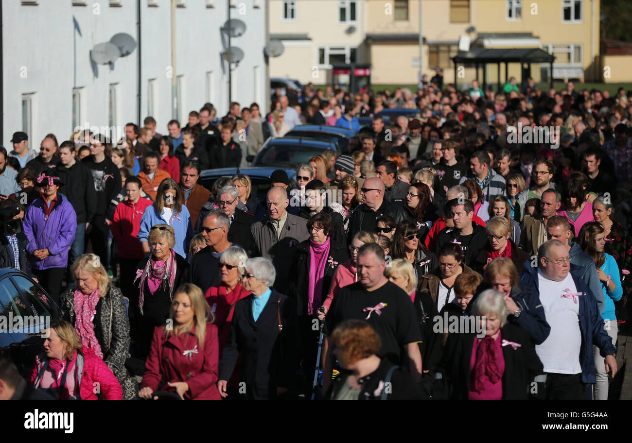 Villagers walk to Sunday church service at St Peter's Church in ...
