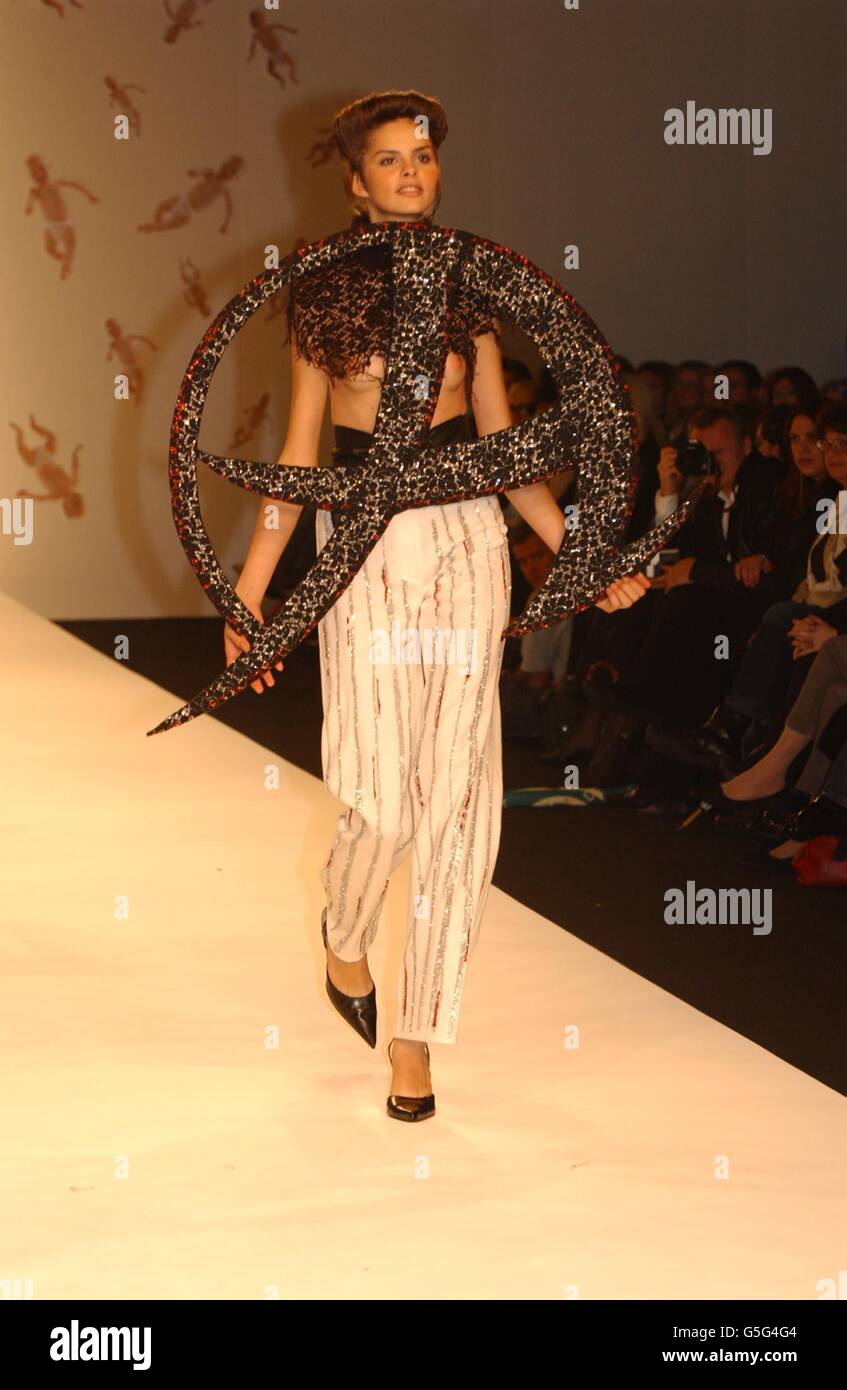 A model wearing a creation from the Arkadius spring-summer catwalk show ...