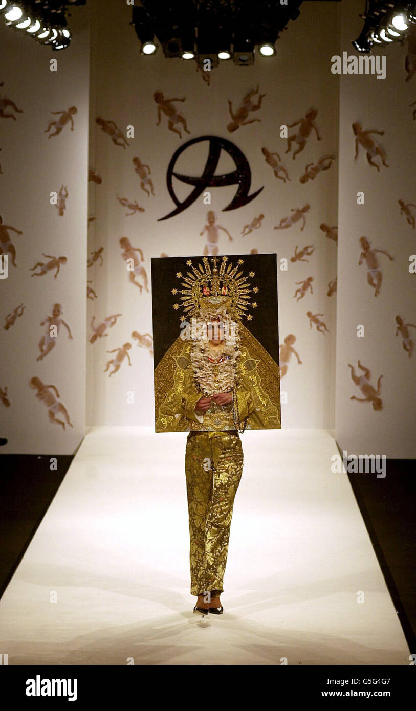 A model wearing a creation from the Arkadius spring-summer catwalk show ...