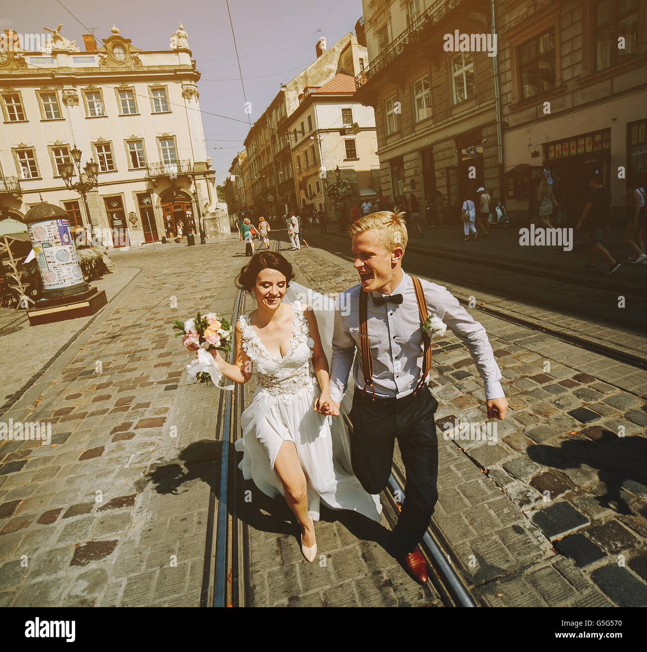 Bride and groom running hi-res stock photography and images - Alamy