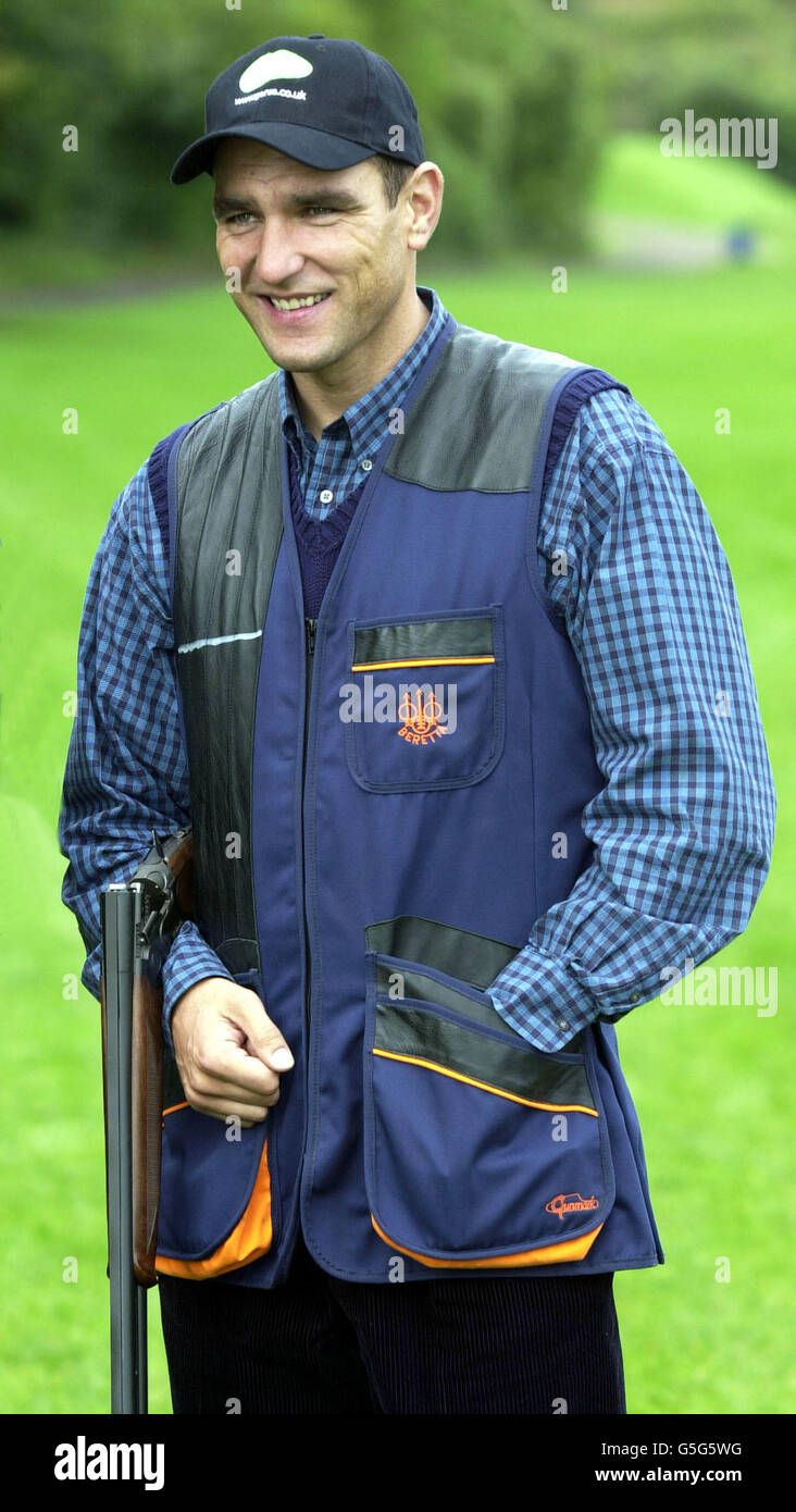 Footballer turned Actor Vinnie Jones poses with his gun during the ...