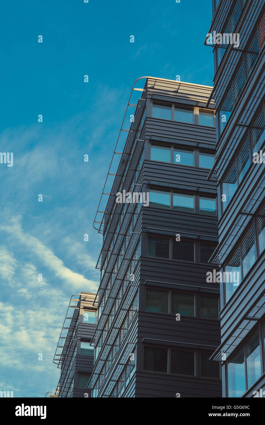 Modern office buildings in a row by the morning light, business concept ...