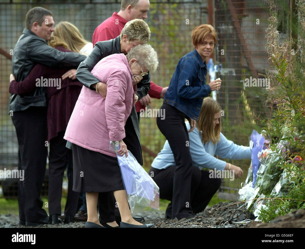 Family members of murder victims John Hall and David McIntosh place ...