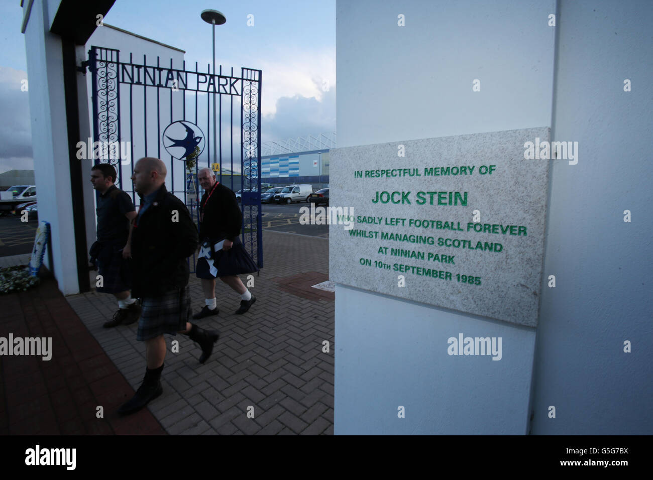 Scotland fans Gary McNamara, Jim Cooper, Bruce Giles walk past the old ...