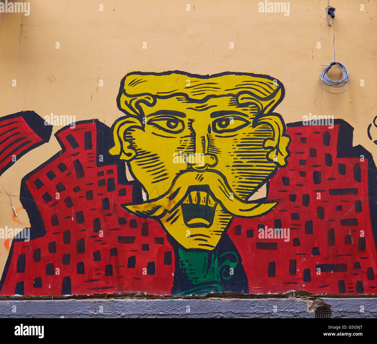 Colourful urban graffiti of head of man with large moustache Naples ...