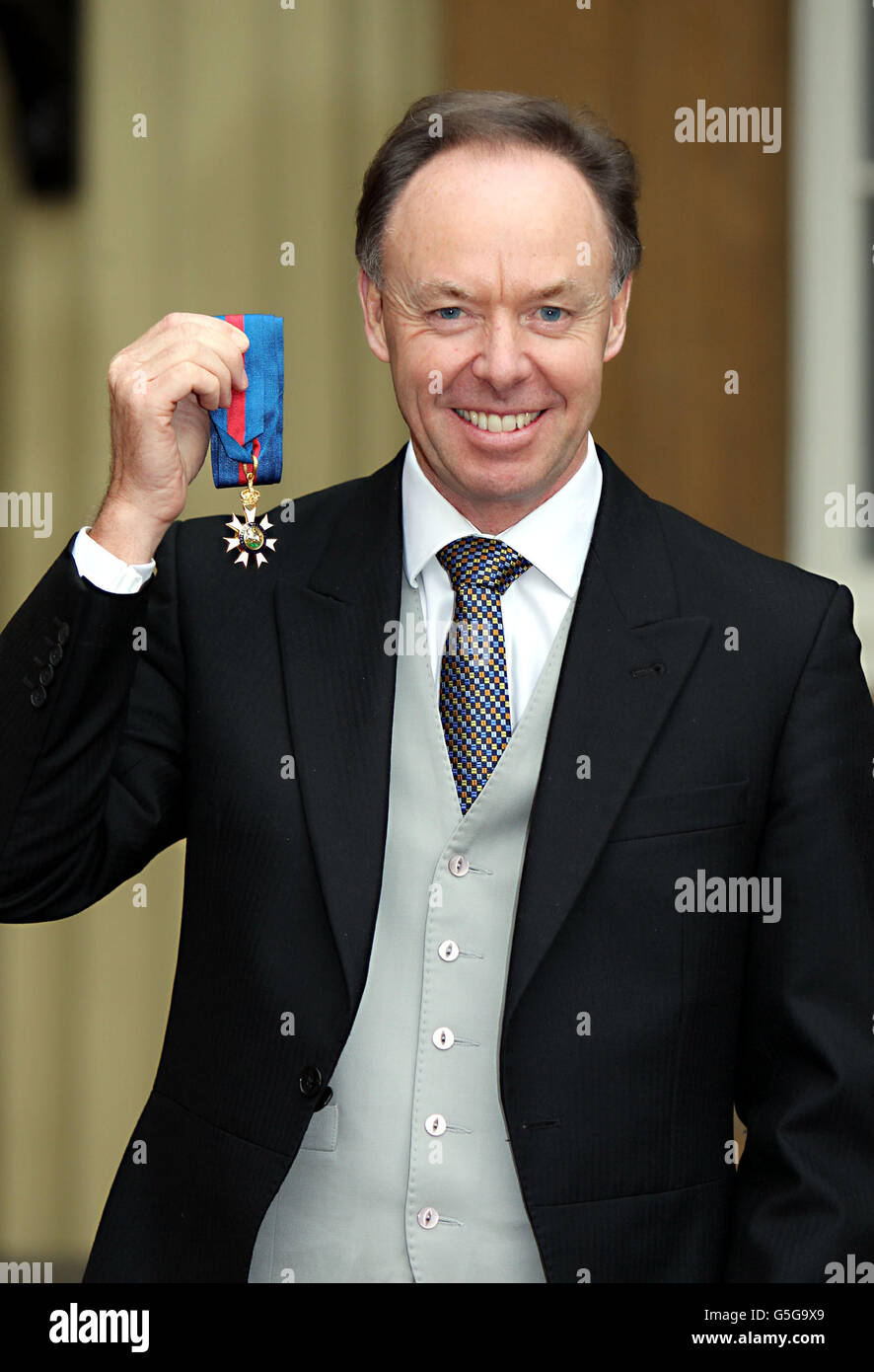 With his knighthood which he received from the queen hi-res stock ...