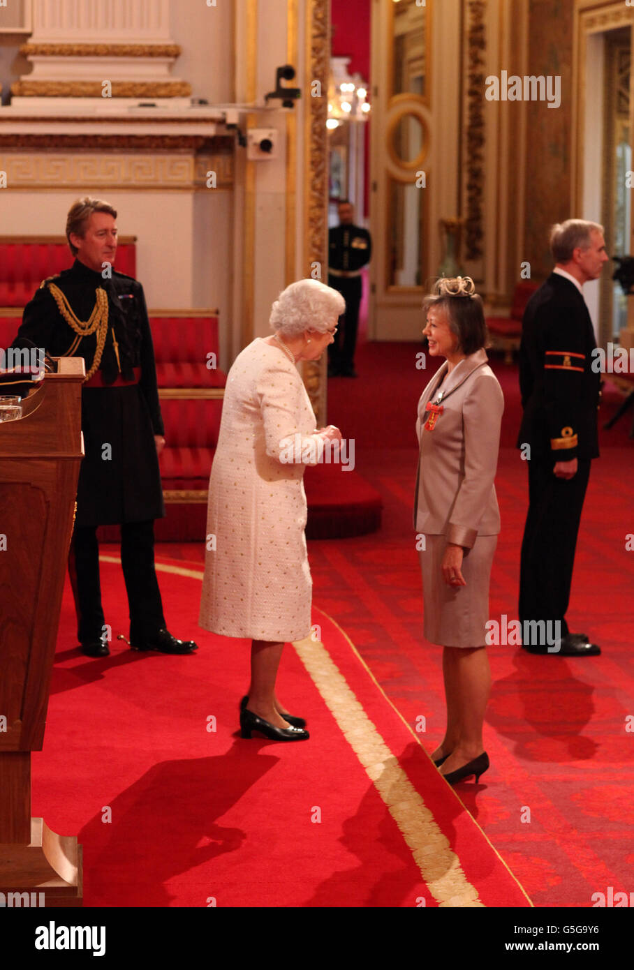 Receives obe queen buckingham palace hi-res stock photography and ...