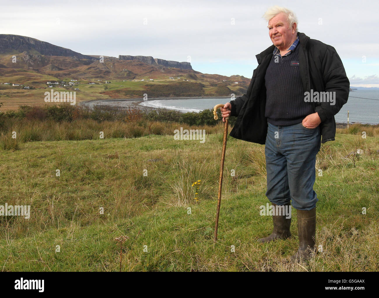 Crofter Iain Macdonald from Staffin on Skye moves his cows across the ...