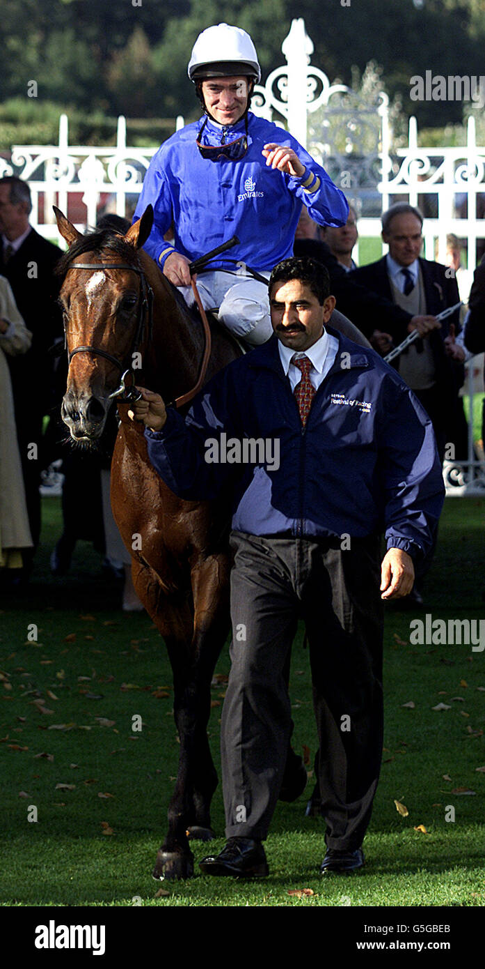 The Queen Elizabeth II Stakes.. Summoner and Richard Hills are led into ...