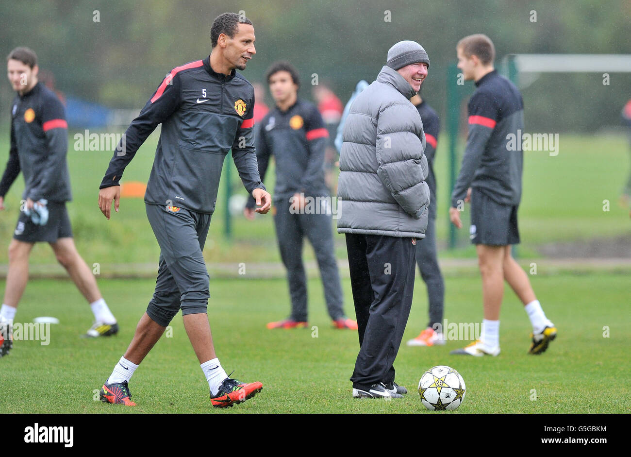 Manchester United's Rio Ferdinand with manager Sir Alex Ferguson during ...