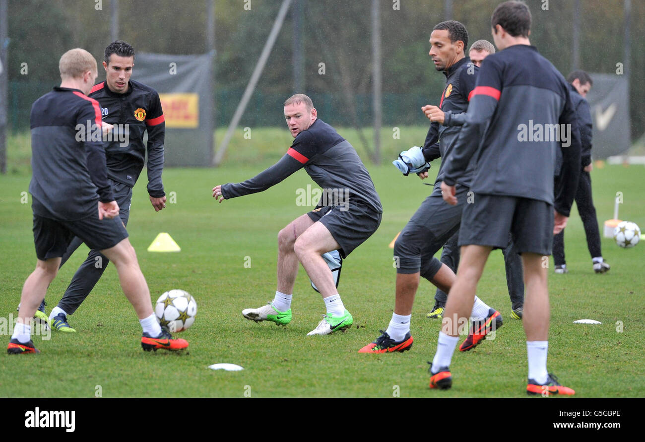 Manchester United's Wayne Rooney (centre) with Rio Ferdinand, Robin Van ...